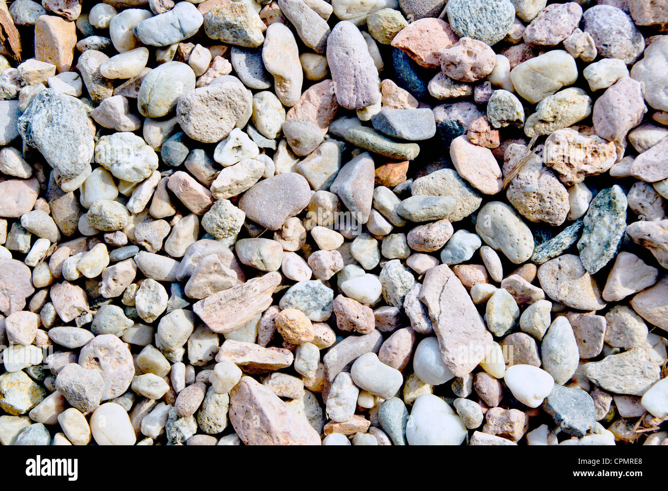 Round pebble stones background Stock Photo - Alamy