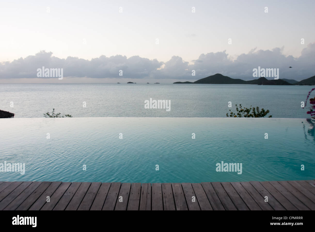 The stunning infinity pool overlooking the clear blue waters of the ...