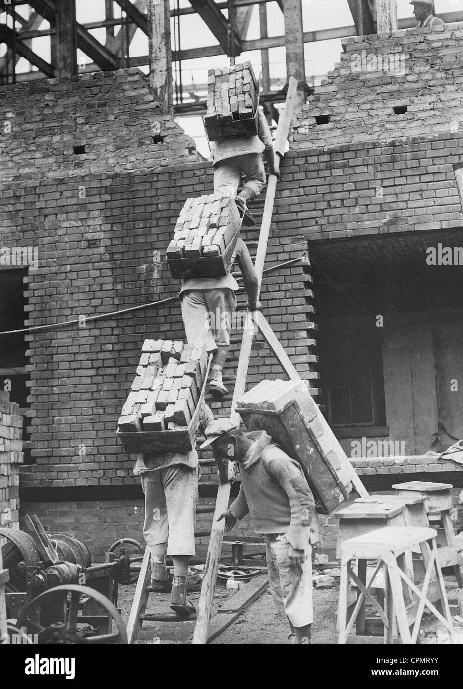 Carry bricks hi-res stock photography and images - Alamy