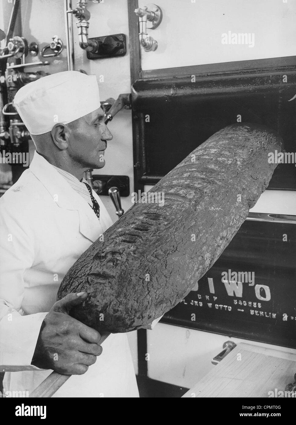 Baking bread, 1935 Stock Photo - Alamy
