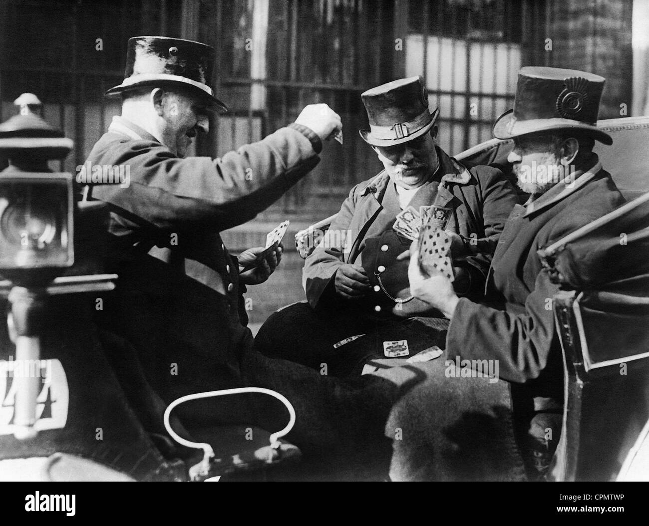 Carriage drivers playing cards, 1927 Stock Photo - Alamy