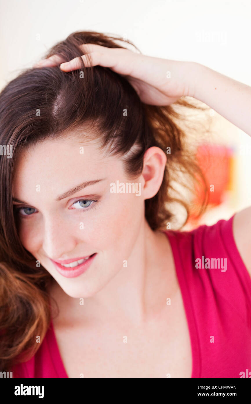 Lady fix hair hi-res stock photography and images - Alamy