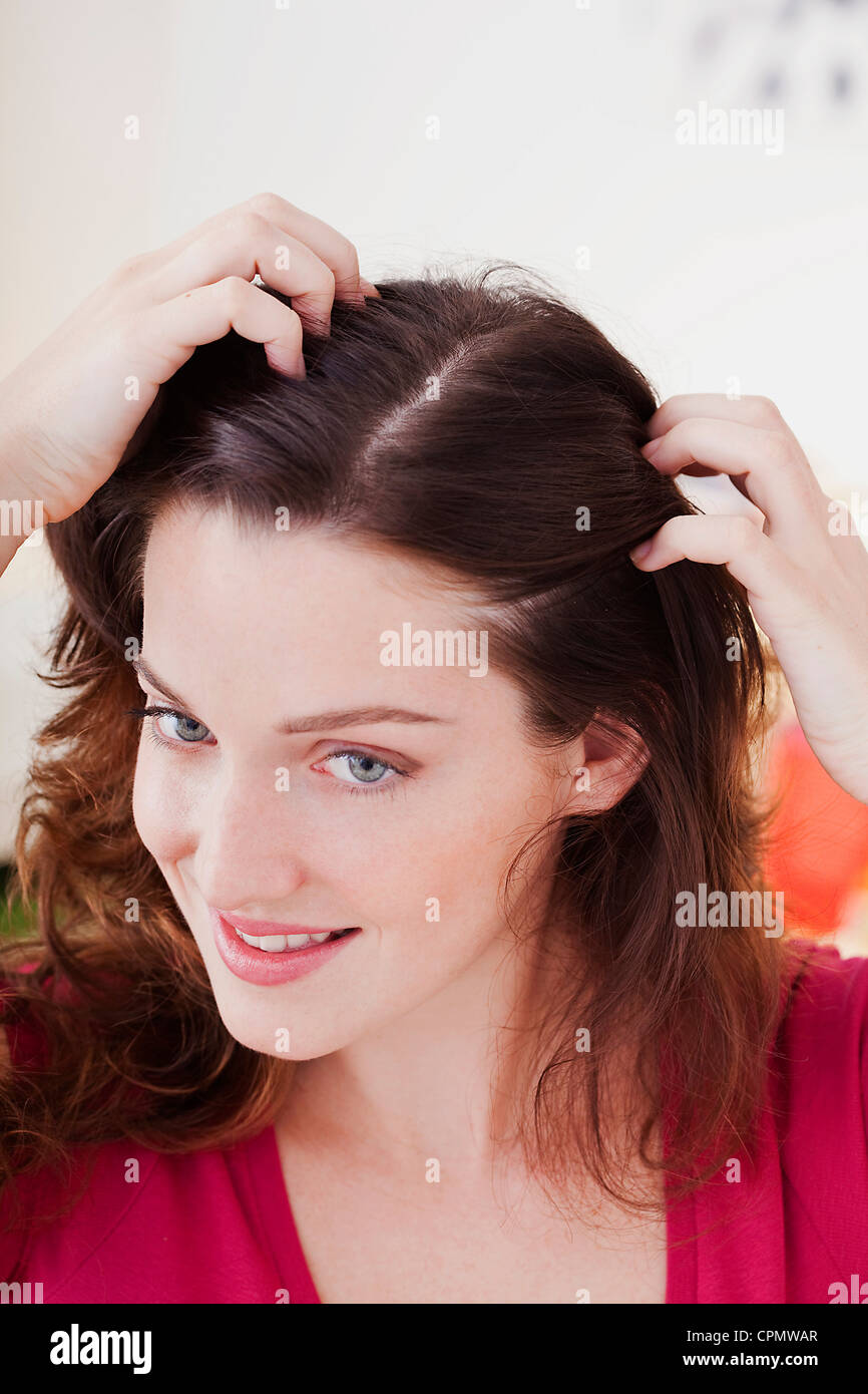 Lady fix hair hi-res stock photography and images - Alamy