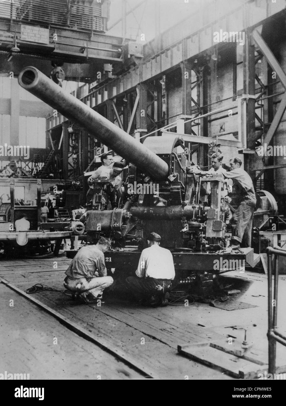 Munitions production in a canon factory in Washington, 1941 Stock Photo ...