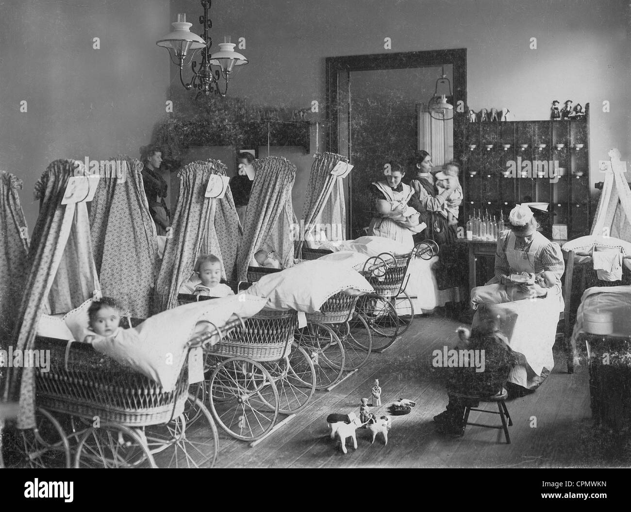 Kindergarten teachers with children, 1899 Stock Photo - Alamy