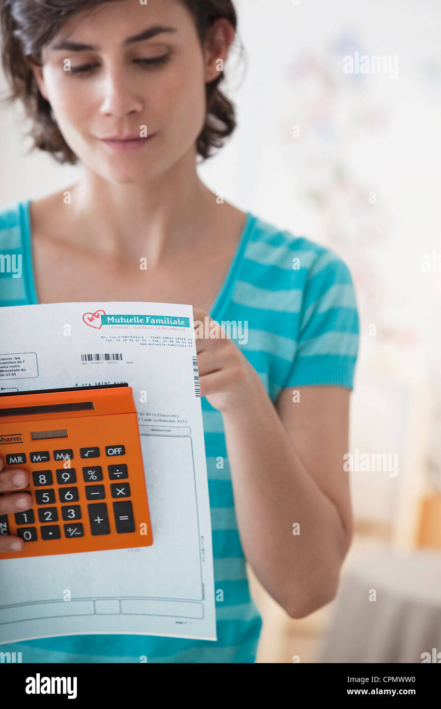 WOMAN DOING PAPERWORK Stock Photo - Alamy