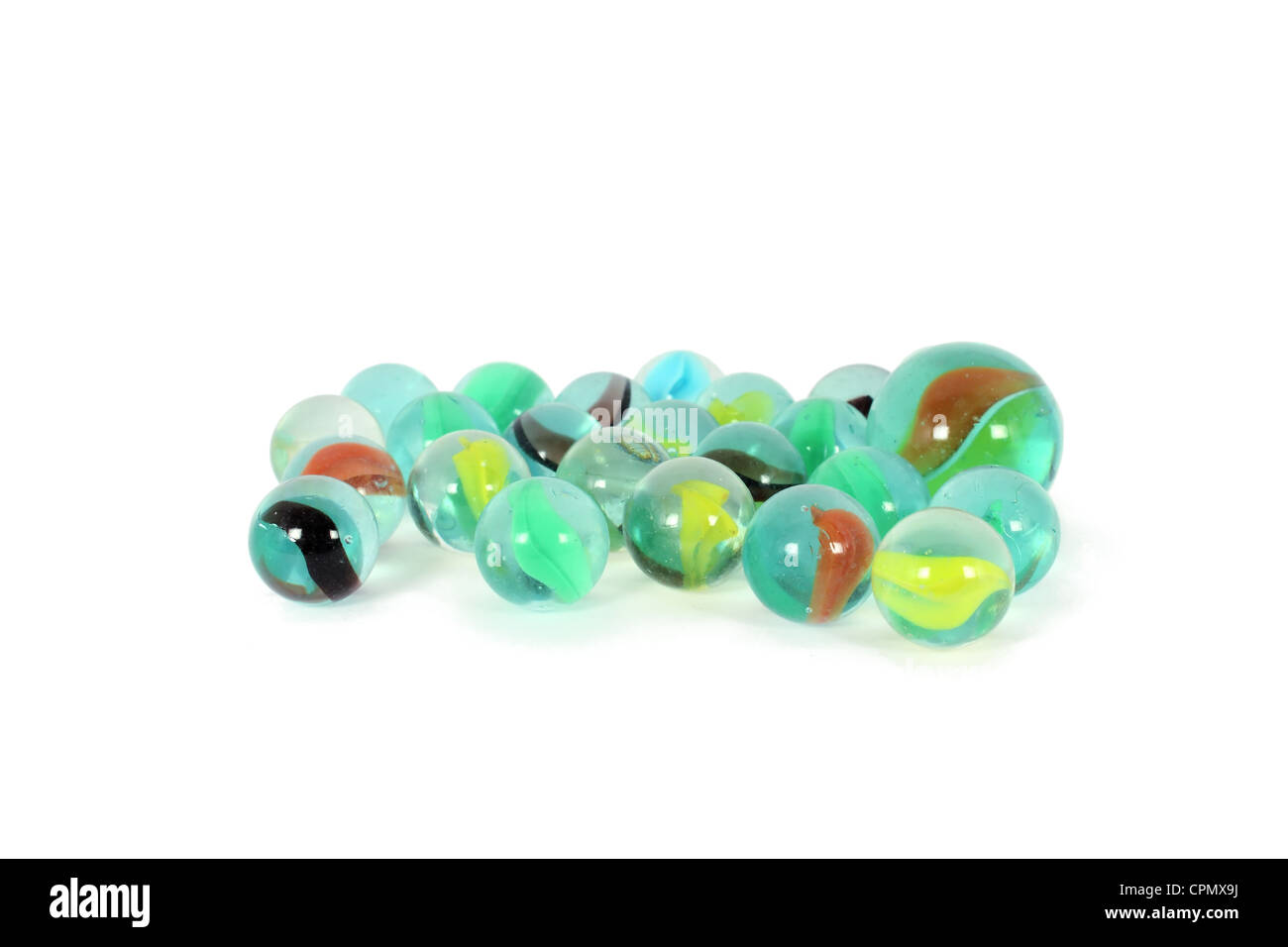 Handful of colorful marbles isolated on white Stock Photo - Alamy