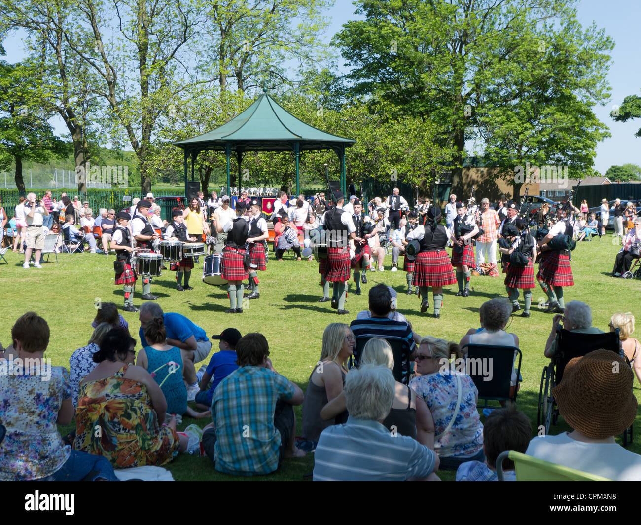 Military pipe band performing in public park, Bury, Lancashire Stock ...