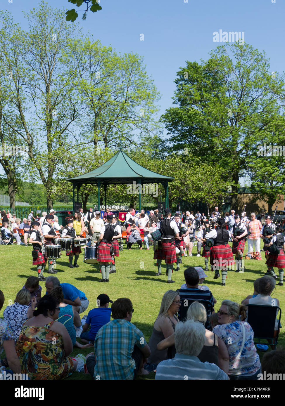 Military pipe band performing in public park, Bury, Lancashire Stock ...