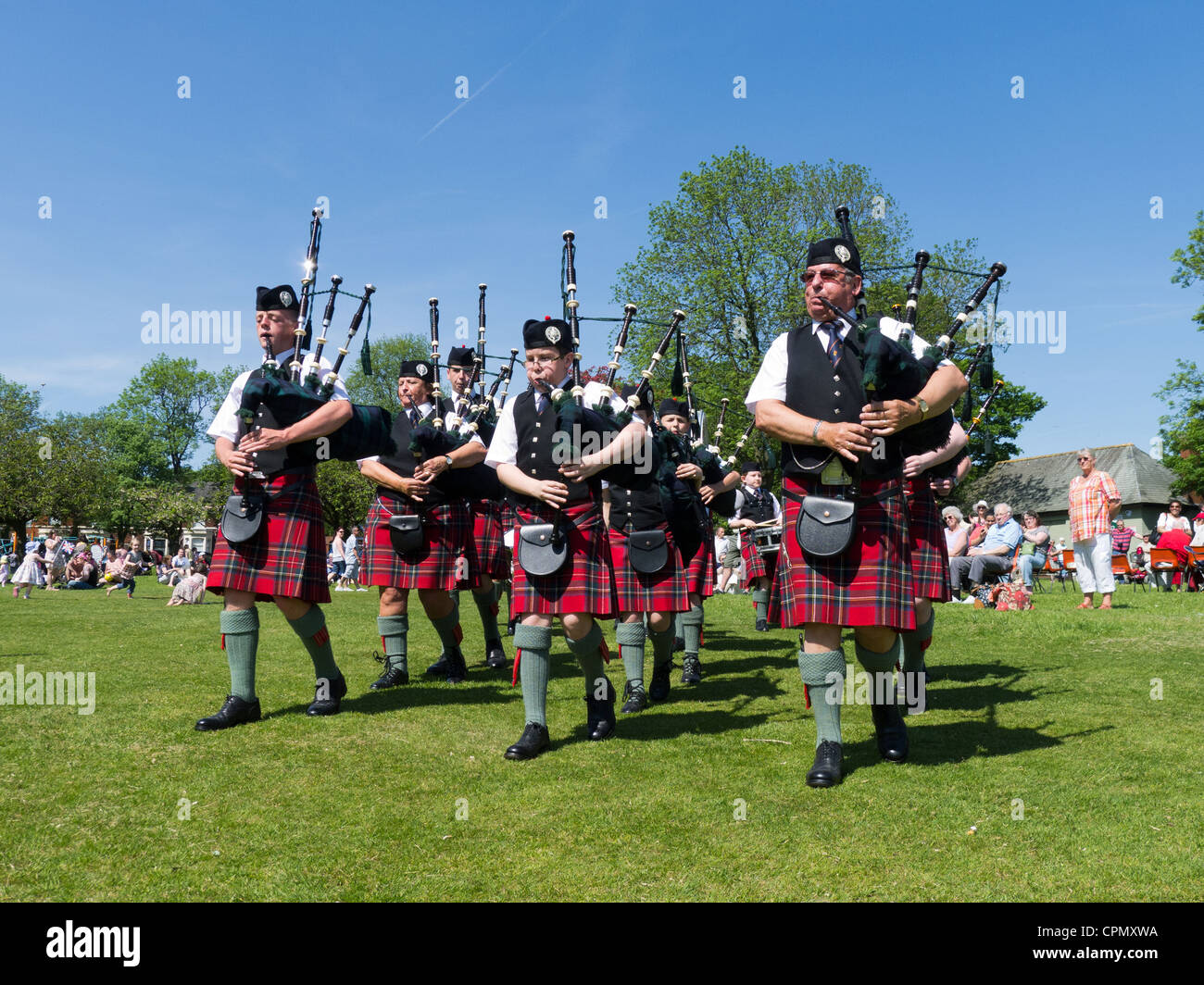 Military pipe band performing in public park, Bury, Lancashire Stock ...