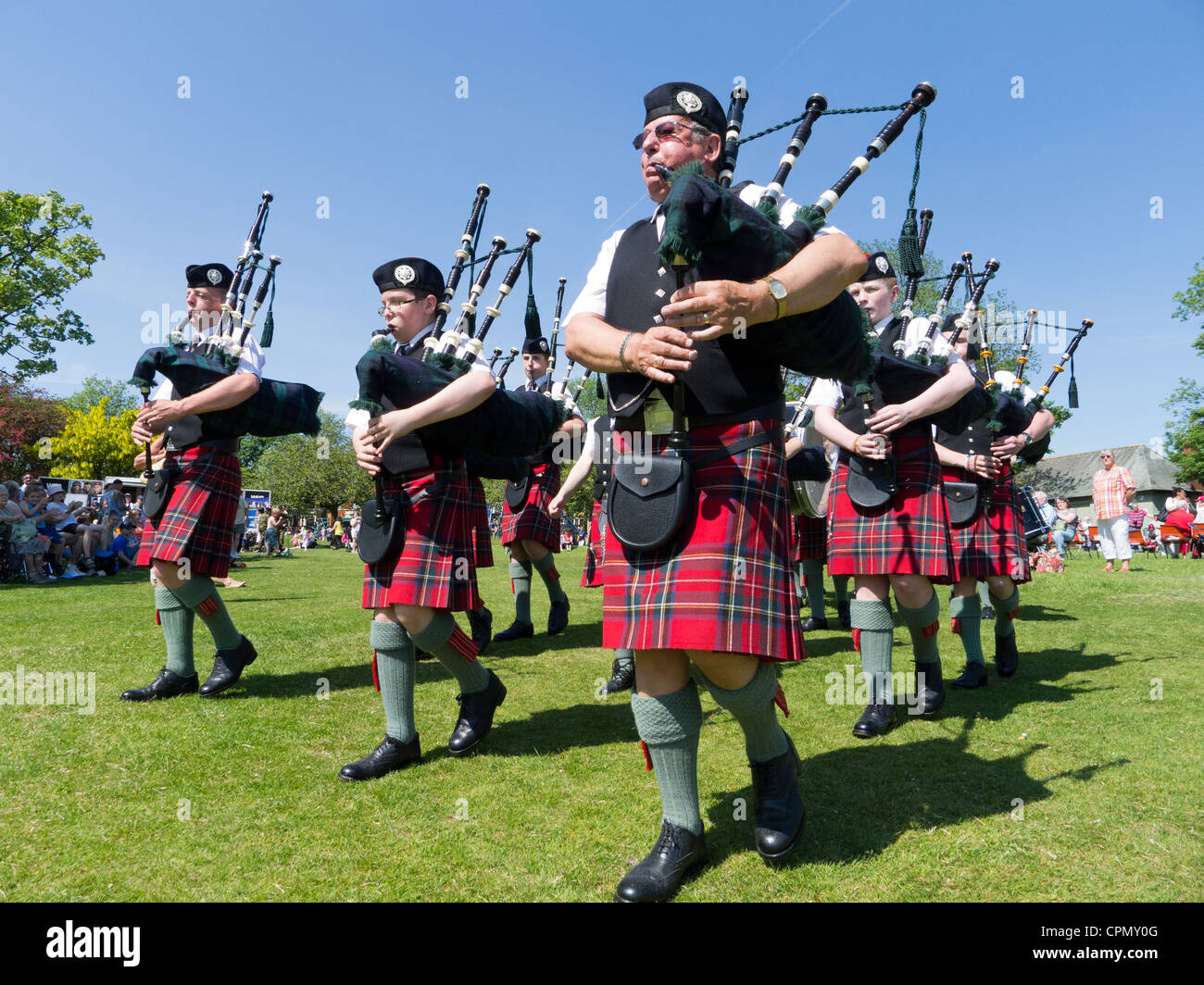 Military pipe band performing in public park, Bury, Lancashire Stock ...