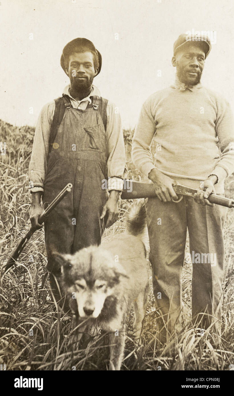Two Middle Aged African-American Hunters & Hunting Dog Stock Photo - Alamy