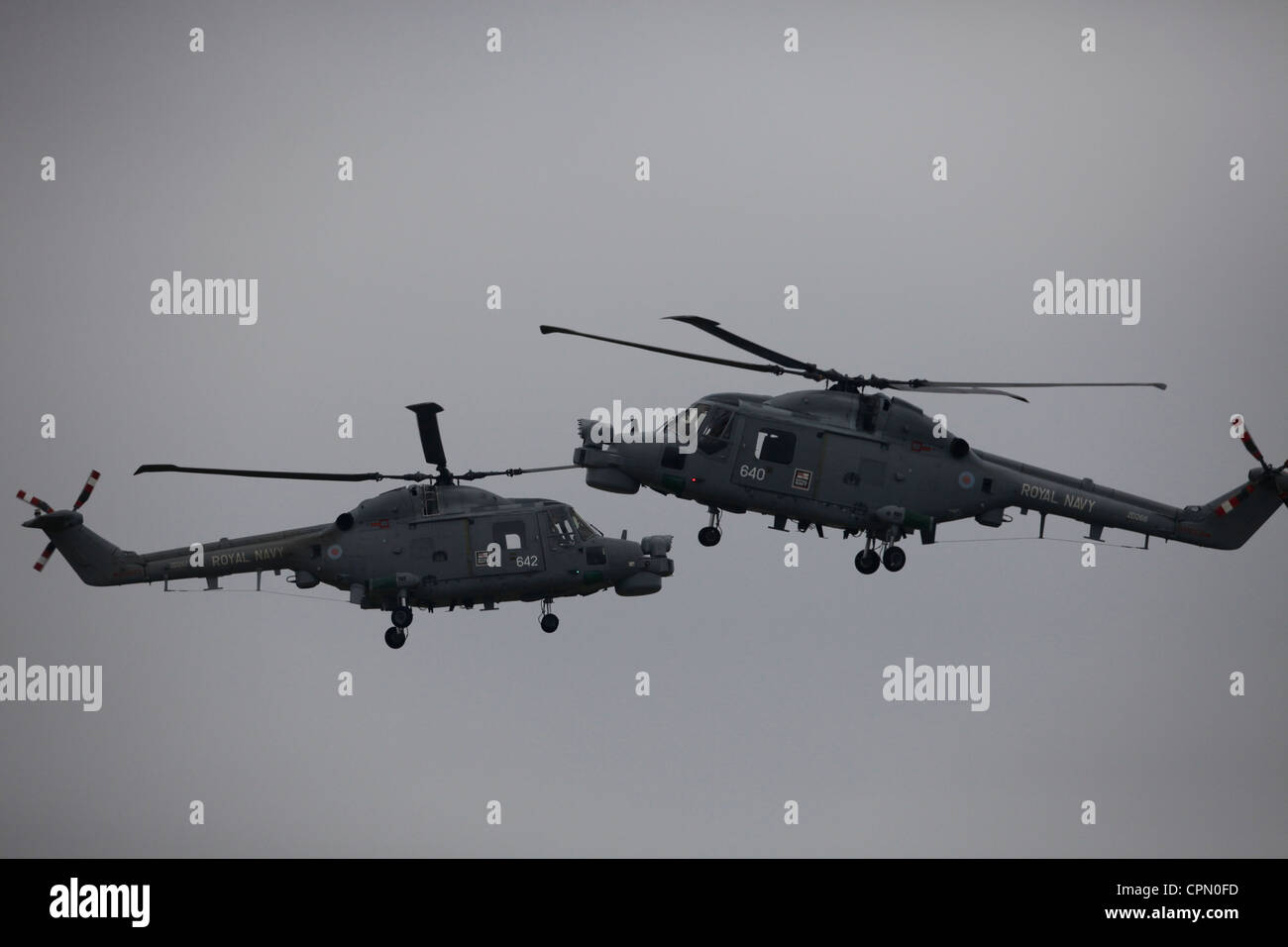 Two Lynx military helicopters perform manoeuvres Stock Photo - Alamy
