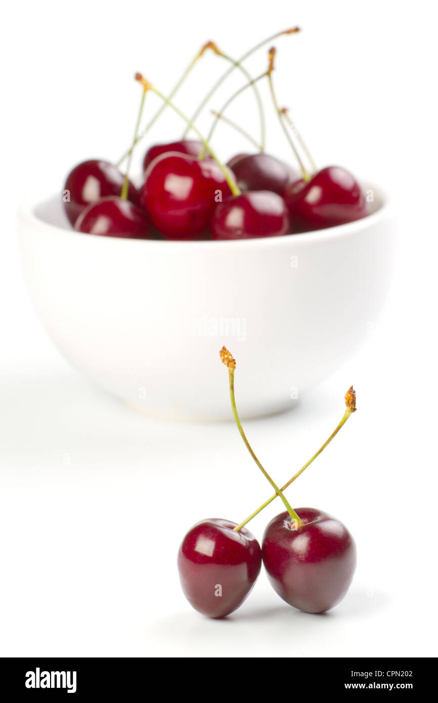 Red ripe cherries on white background Stock Photo - Alamy
