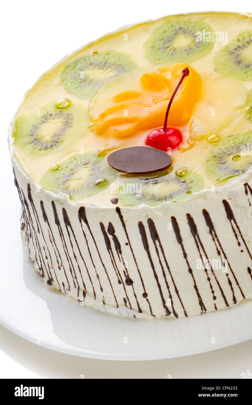 Tasty creamy cake with fruits Stock Photo - Alamy