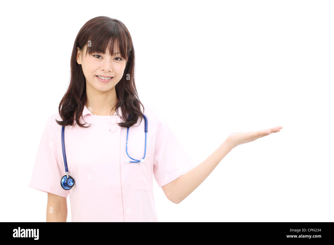 Young asian female nurse rise hand showing blank sign Stock Photo - Alamy