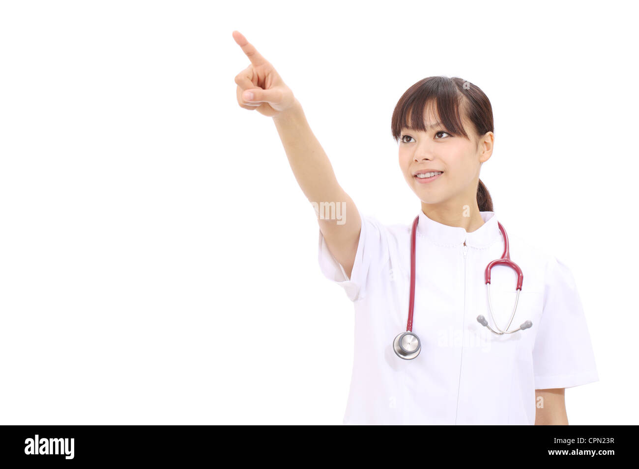 Young asian female nurse pointing Stock Photo - Alamy