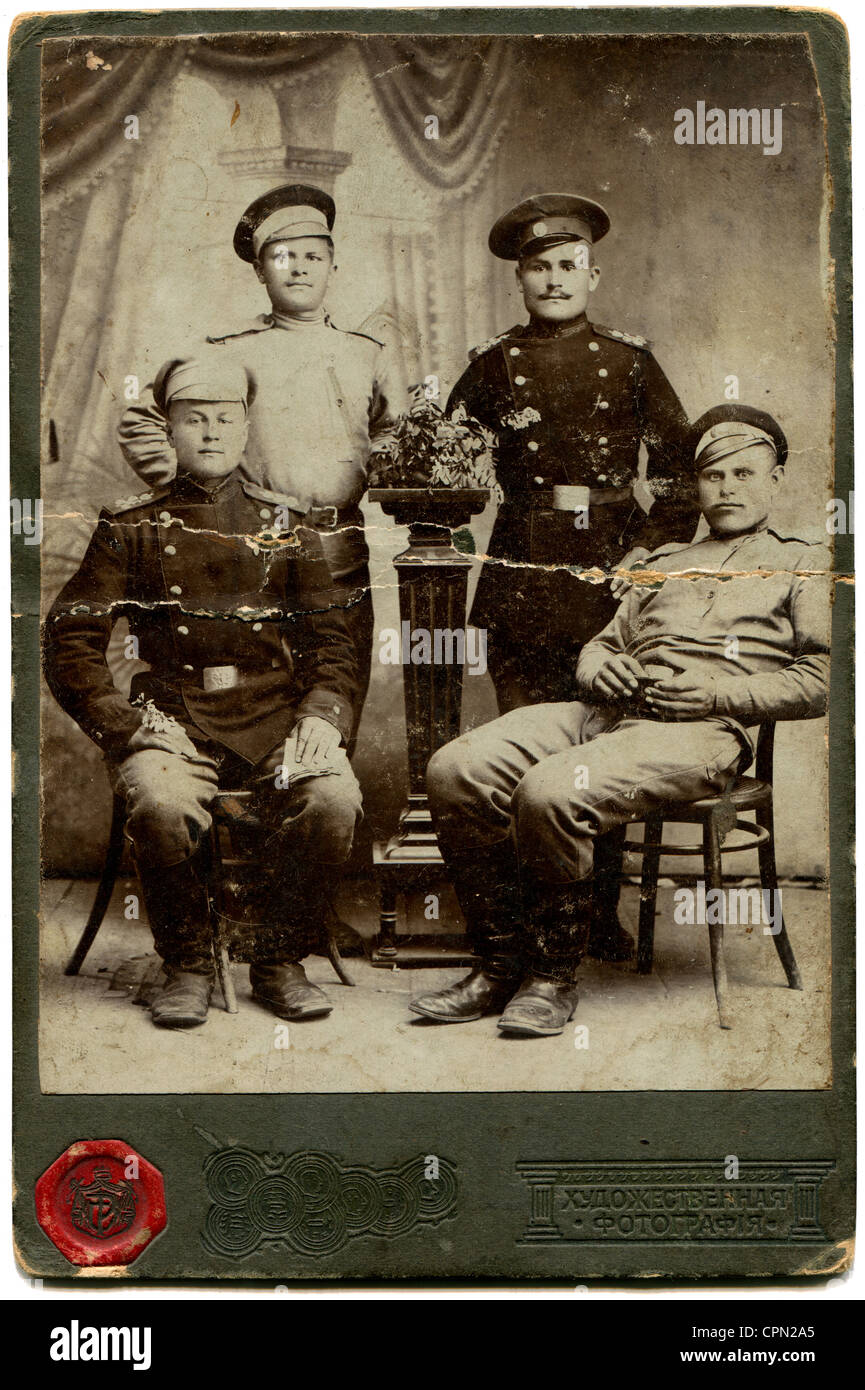 An antique photo shows four soldiers Stock Photo - Alamy