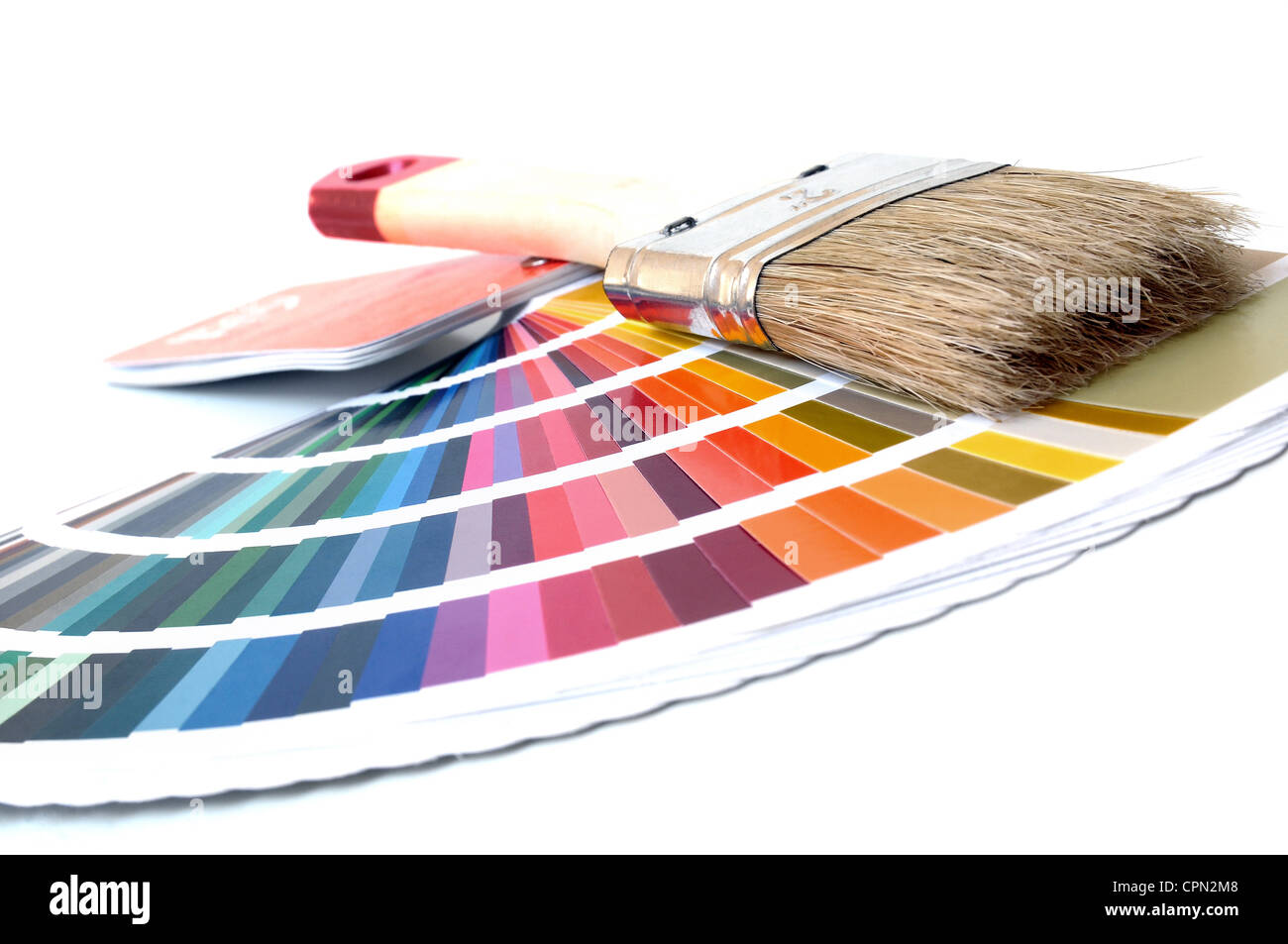 Color chart with paint brush on white background Stock Photo - Alamy