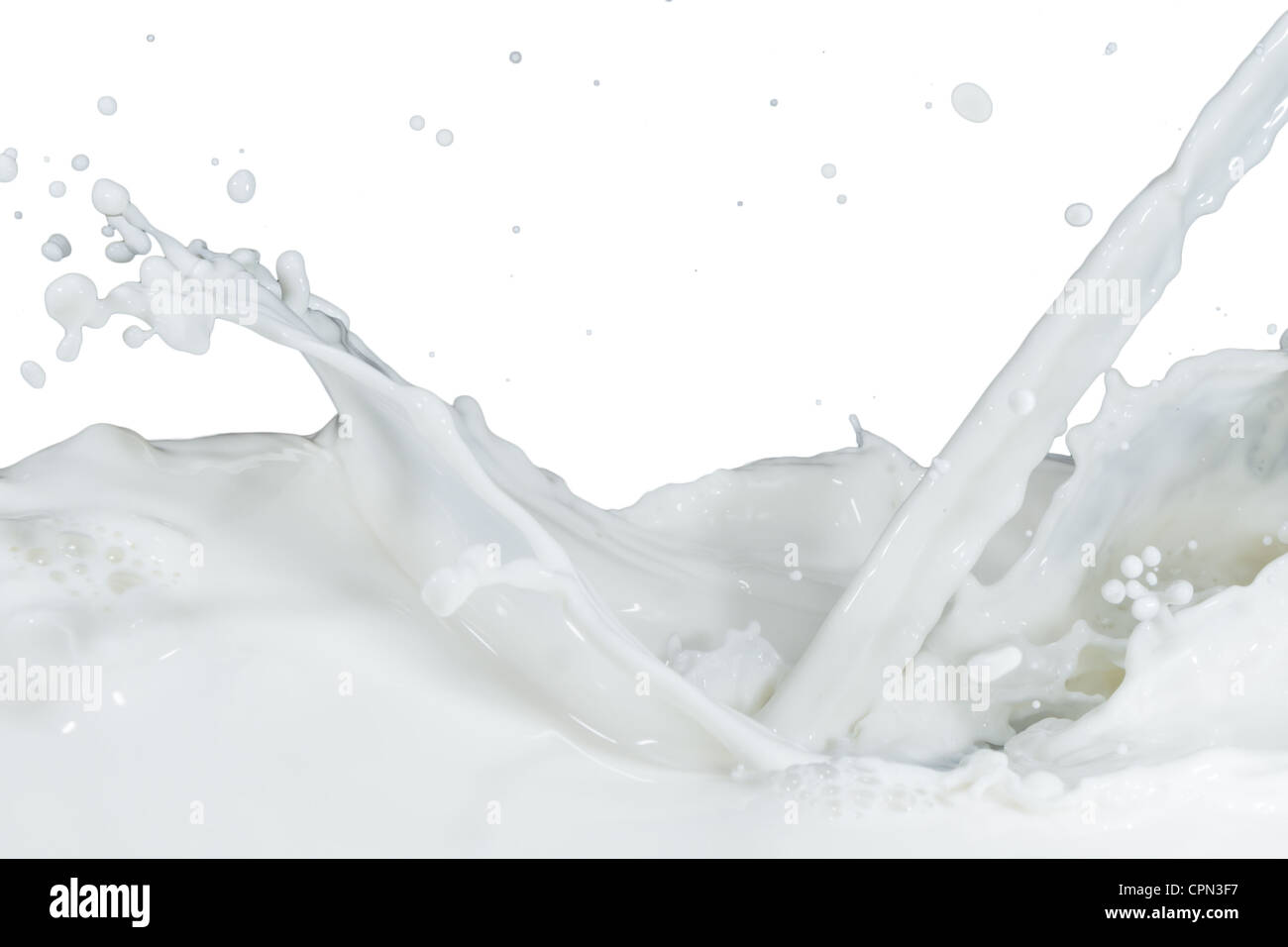 splashing milk isolated on white background Stock Photo - Alamy