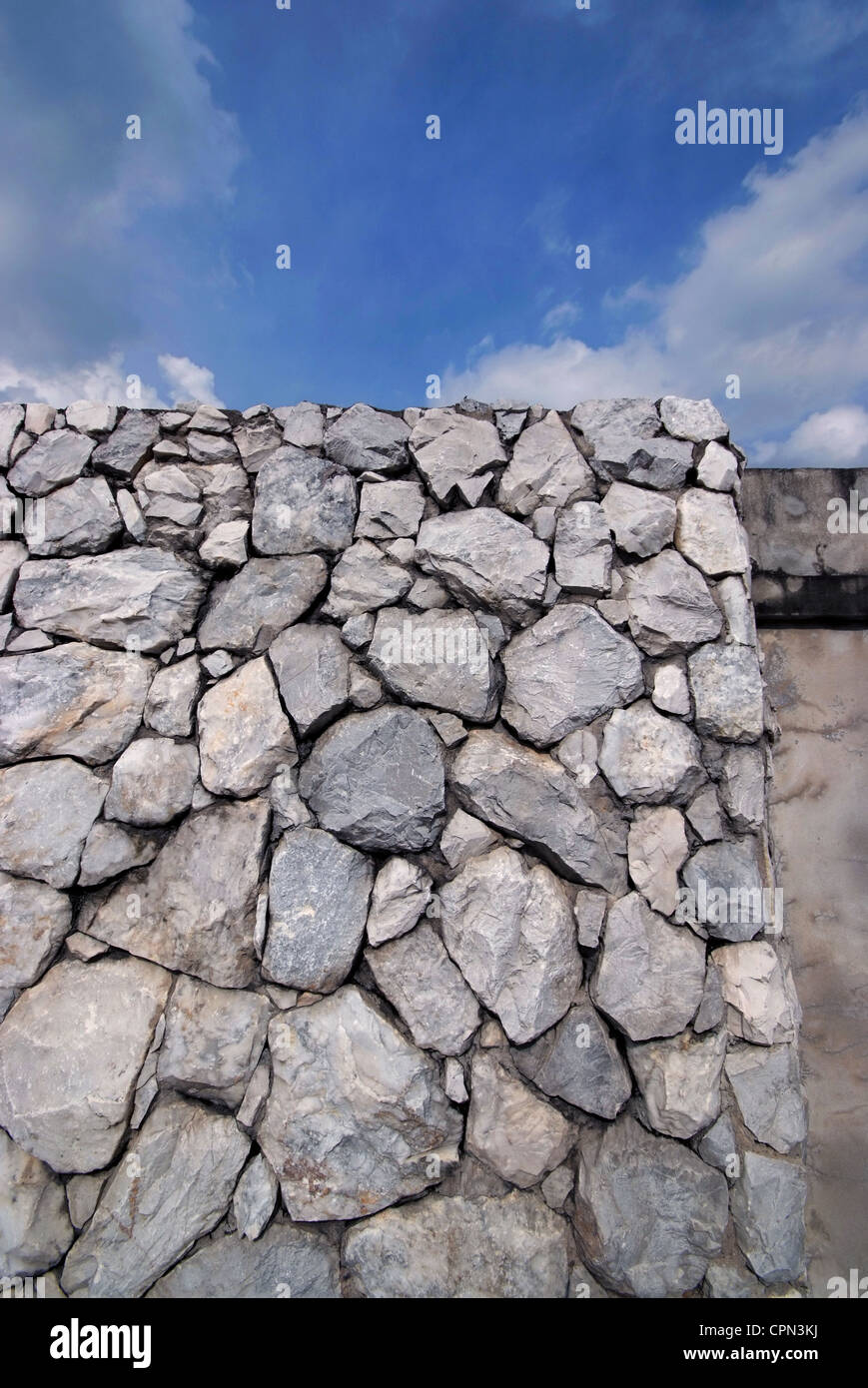 Sky and Stone wall background Stock Photo - Alamy