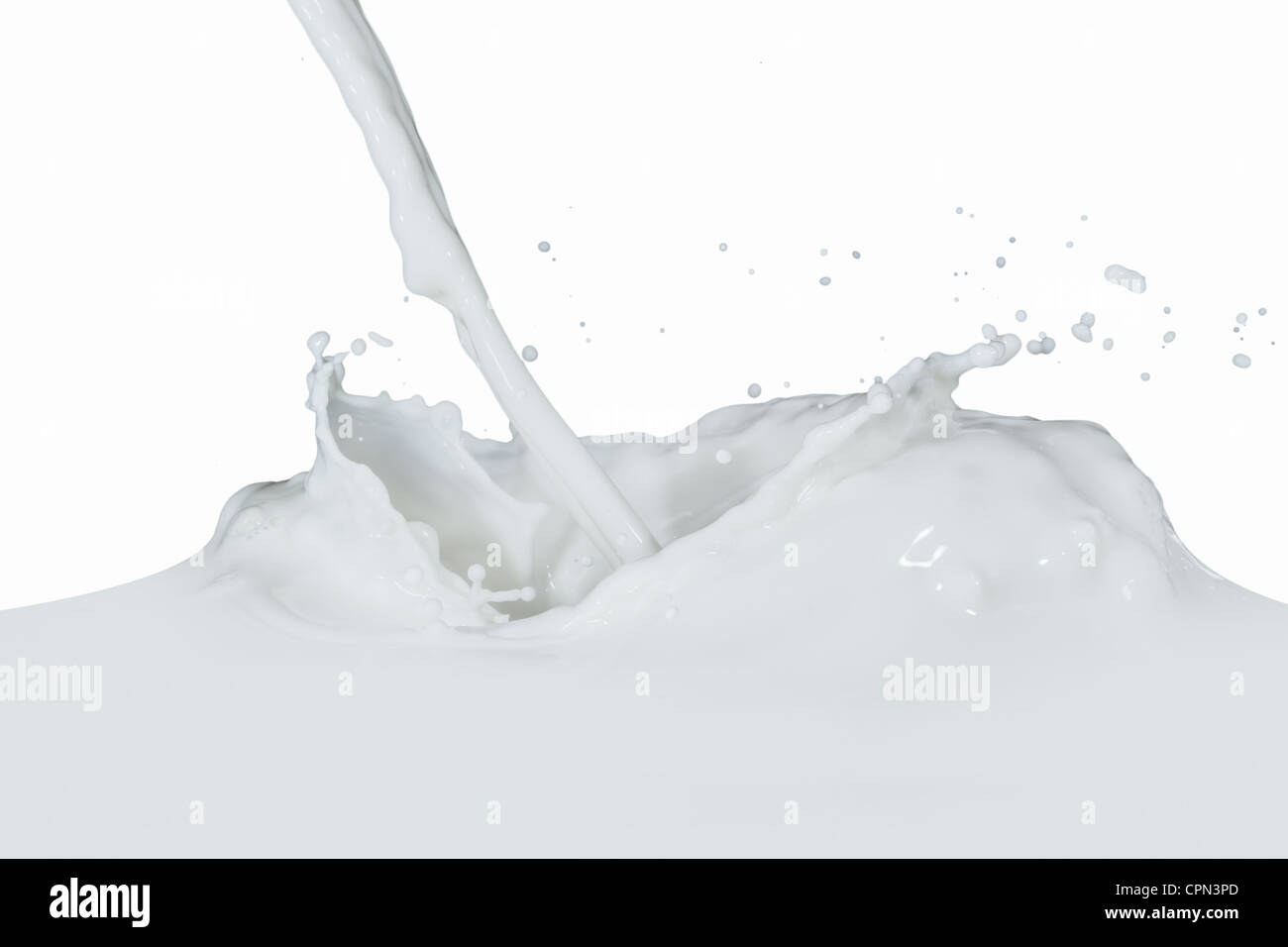 splashing milk isolated on white background Stock Photo - Alamy
