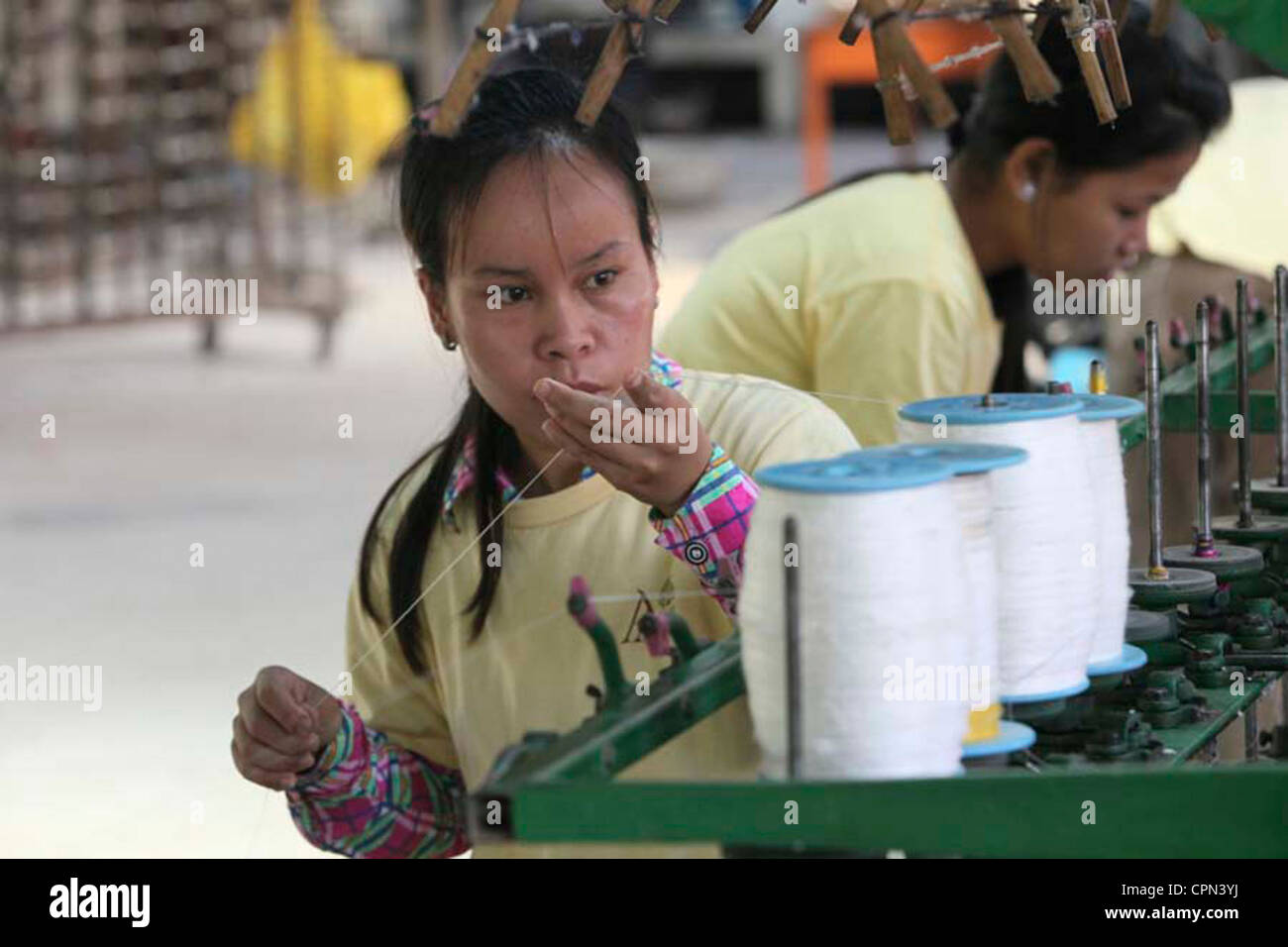 Fabric cambodia industry textiles hi-res stock photography and images ...