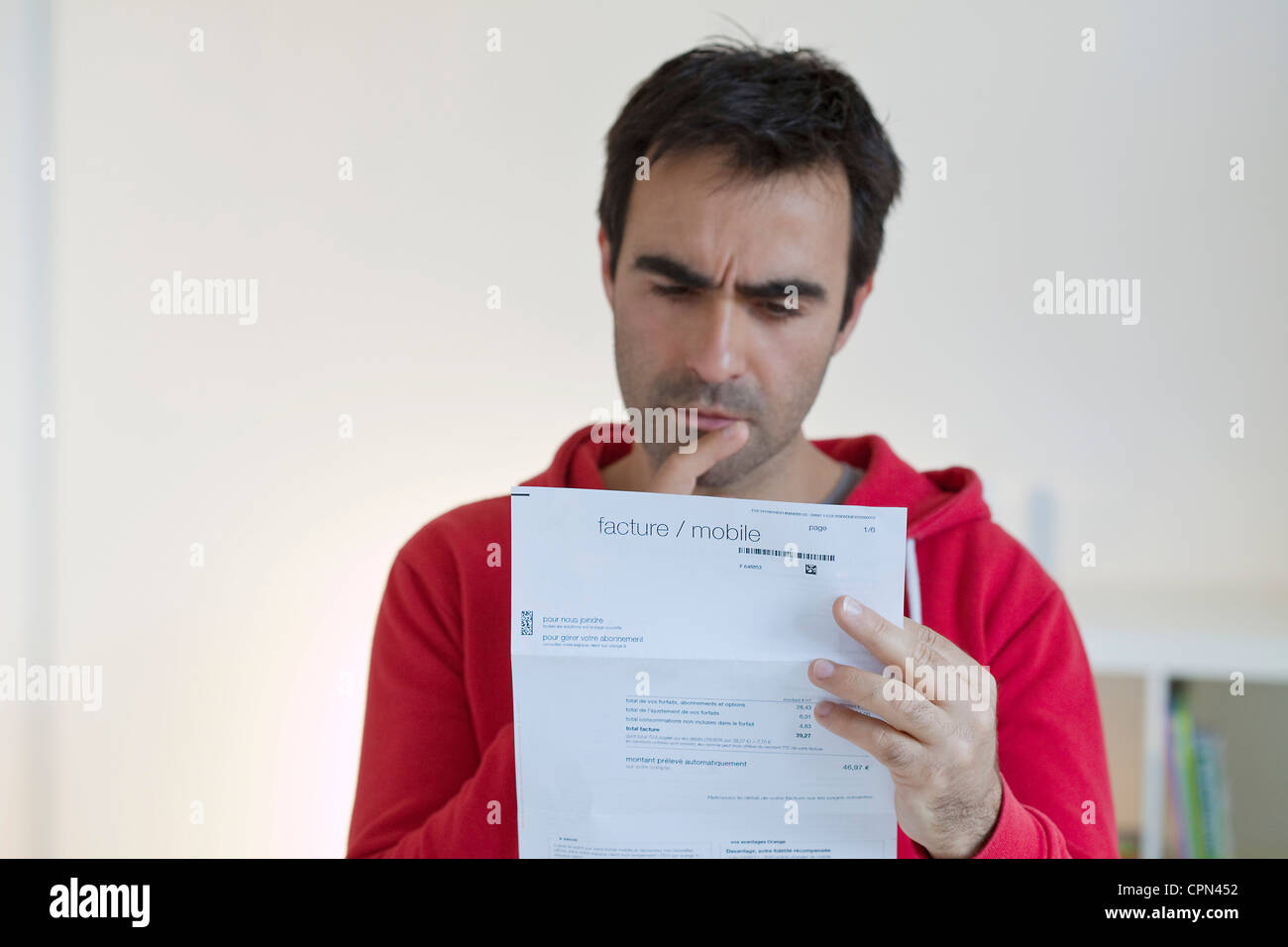 MAN FILLING OUT FORMS Stock Photo - Alamy