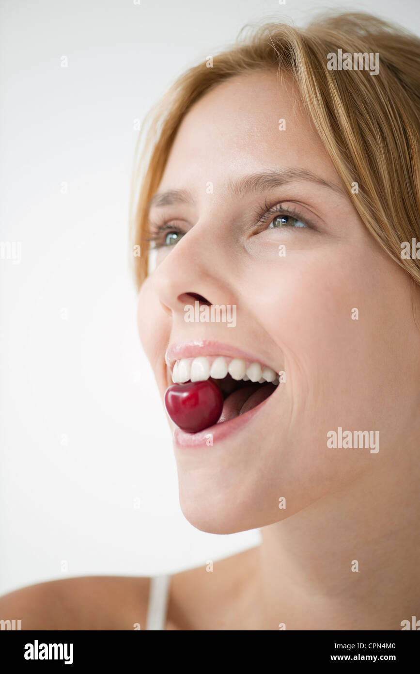 Woman young cherry eat portrait hi-res stock photography and images - Alamy
