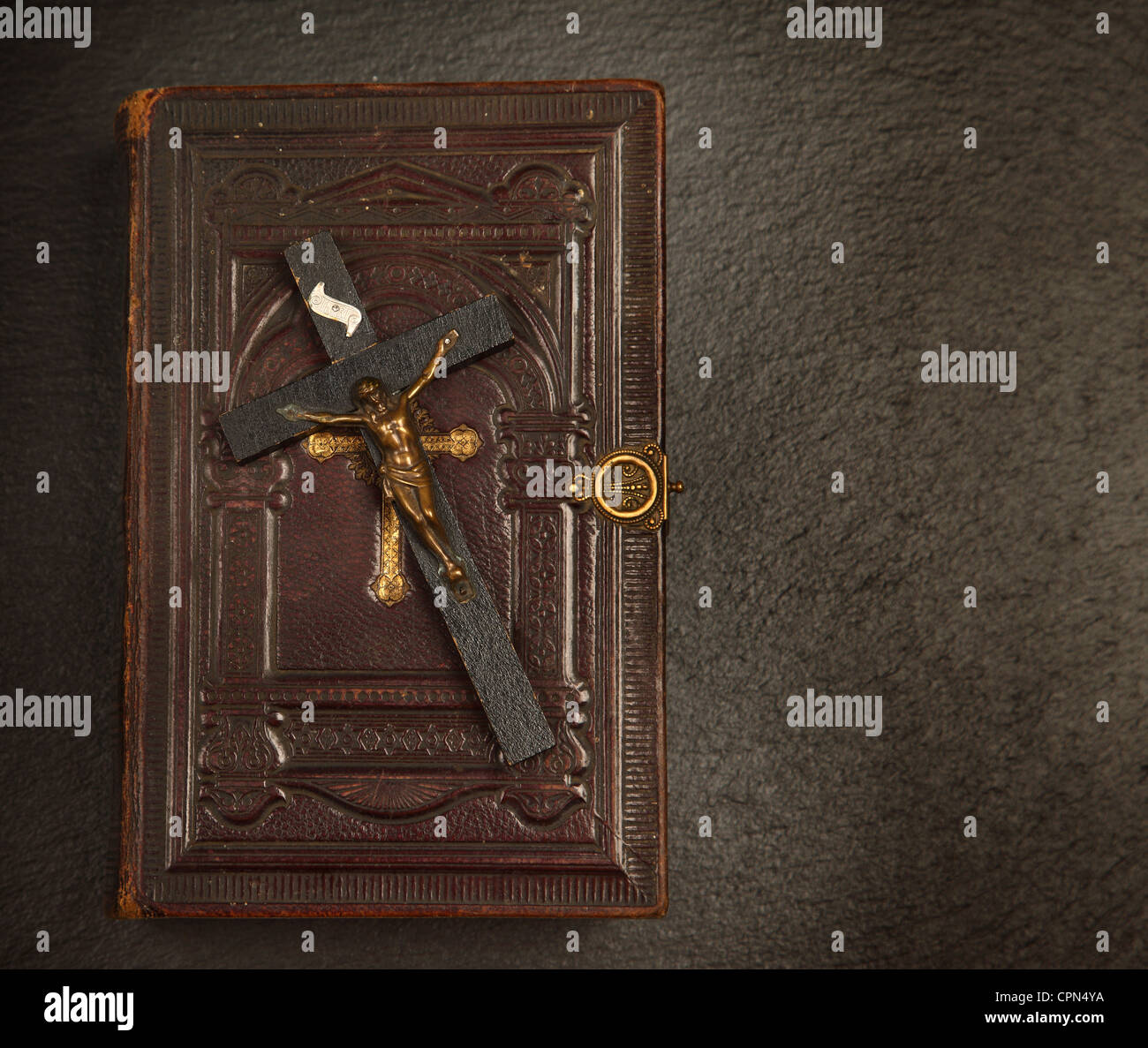 Old bible with The Cross on dark background Stock Photo - Alamy