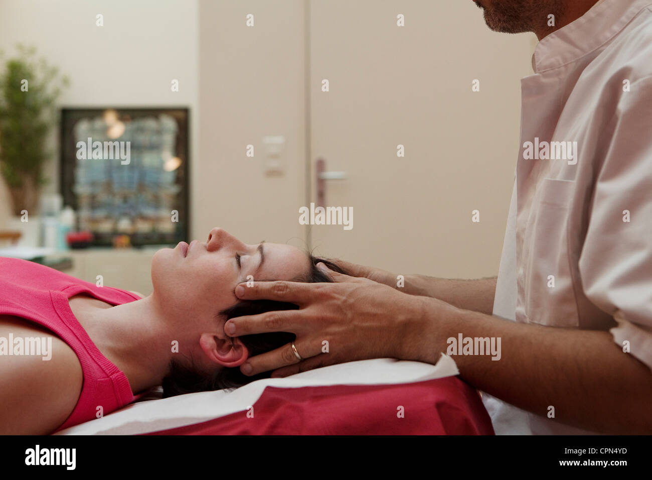 Cranial osteopathy hi-res stock photography and images - Alamy