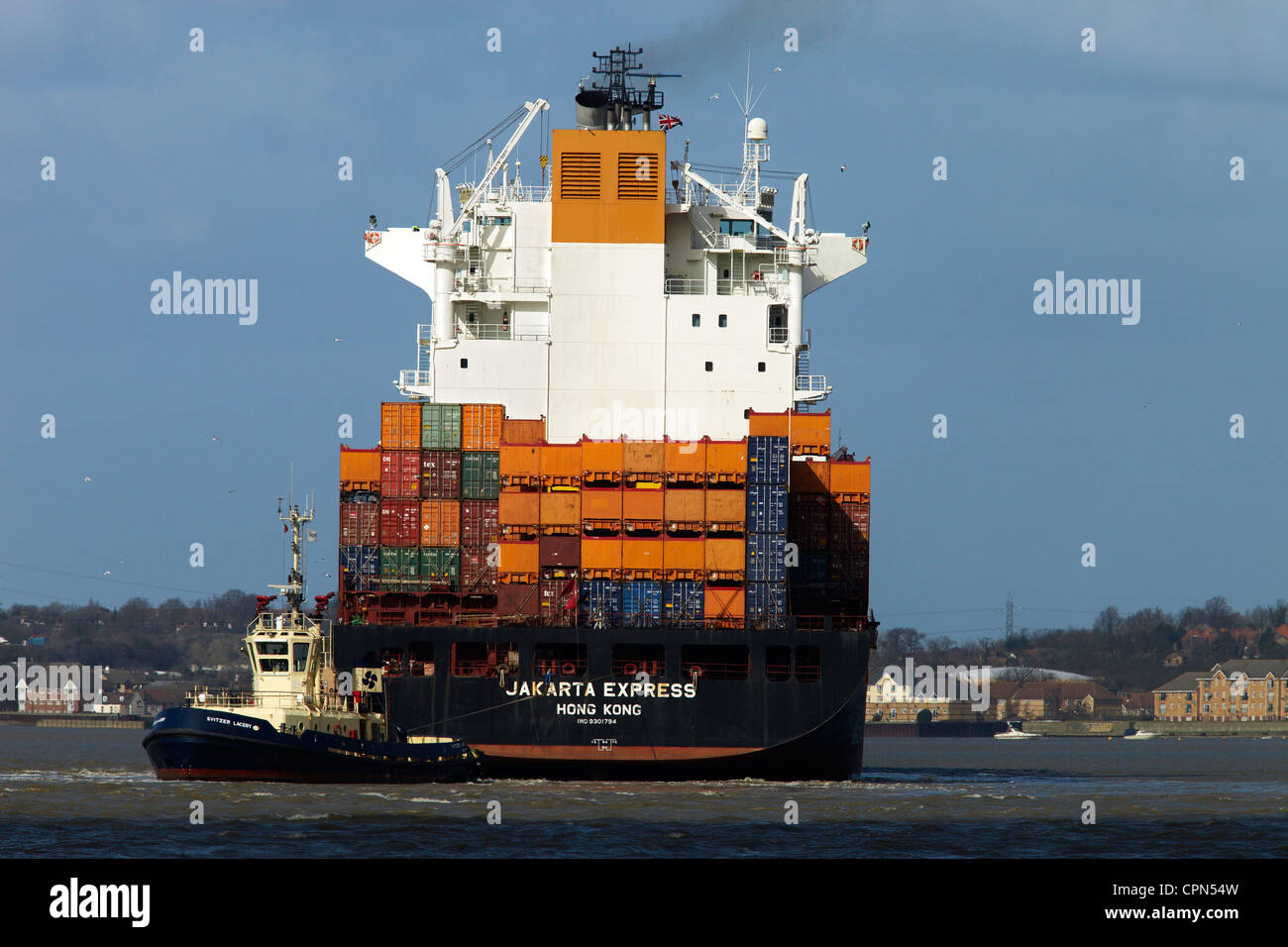 The container ship Jakarta Express arriving at Tilbury docks on the ...