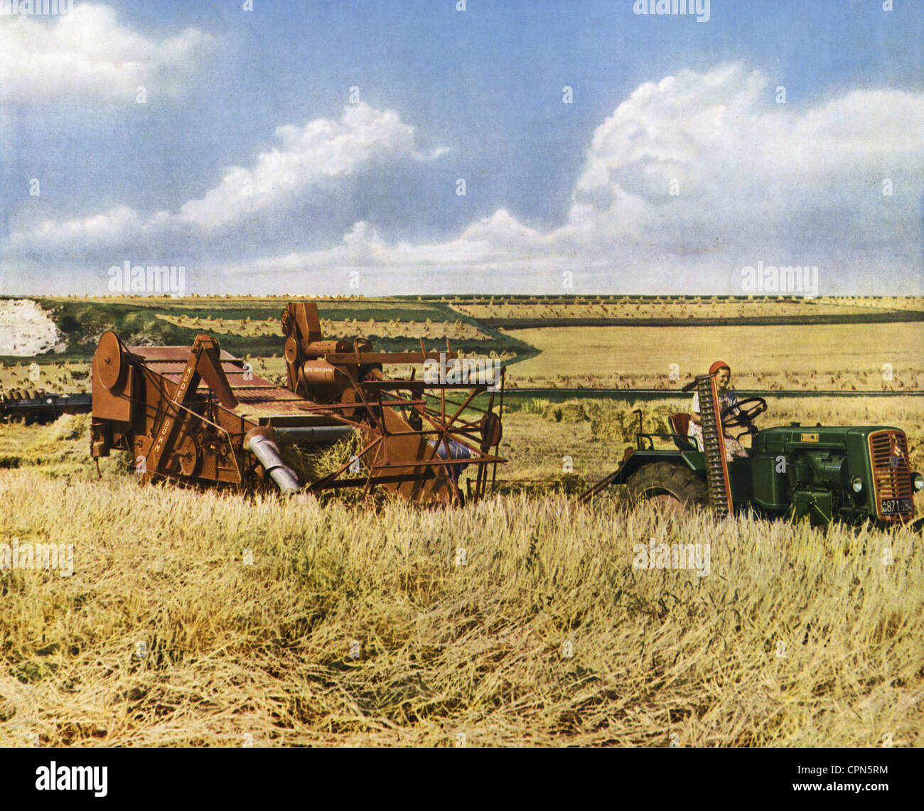 Combines at work during wheat harvest hi-res stock photography and ...