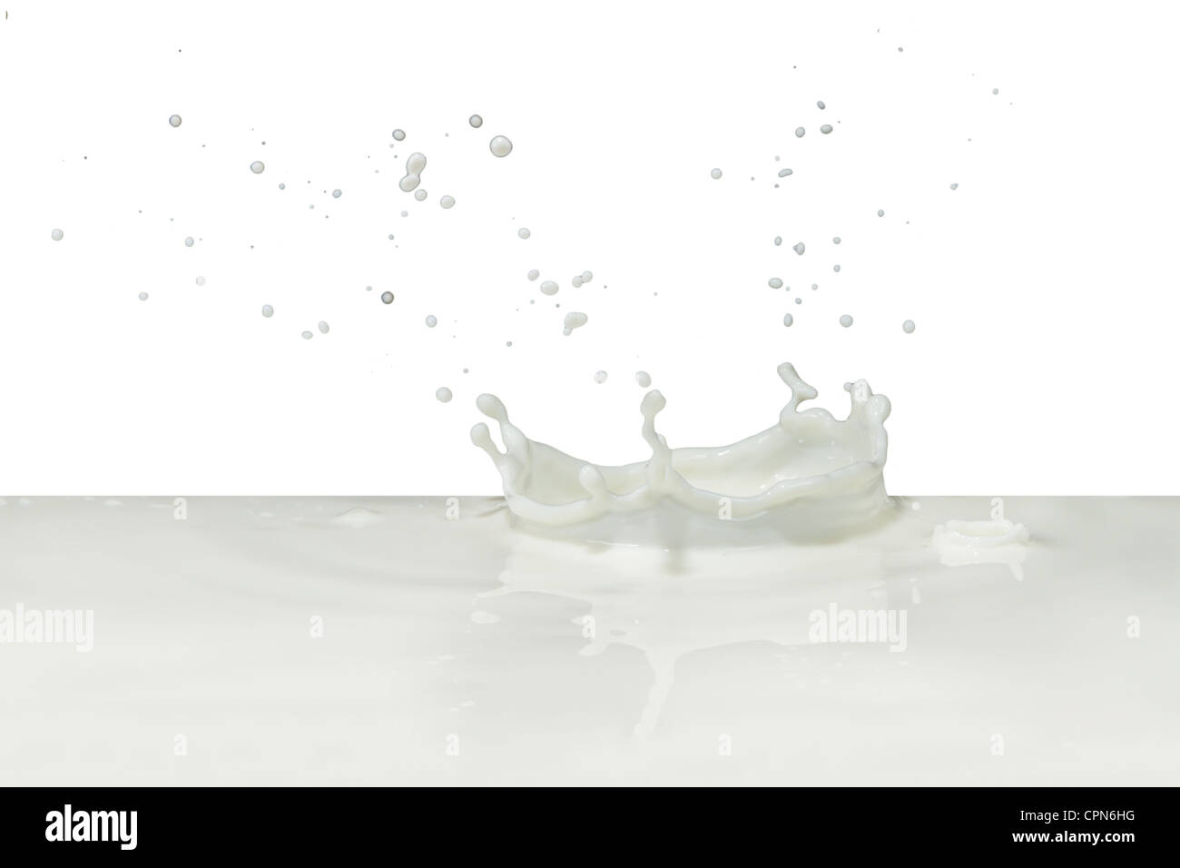 splashing milk isolated on white background Stock Photo - Alamy