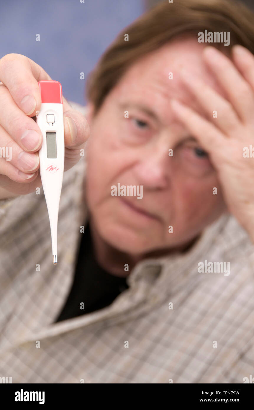 FEVER IN AN ELDERLY PERSON Stock Photo - Alamy