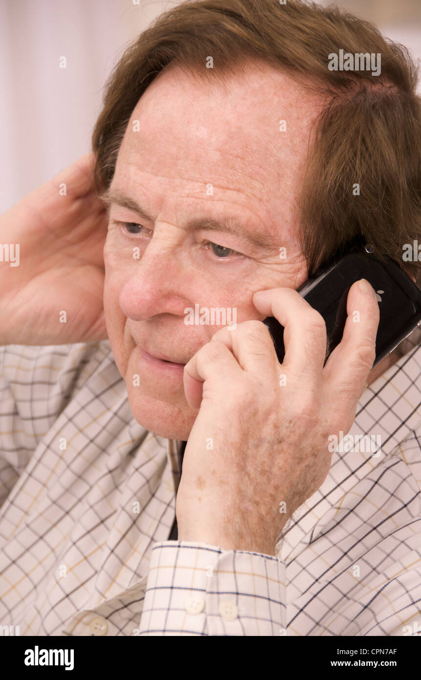 ELDERLY PERSON ON THE PHONE Stock Photo - Alamy