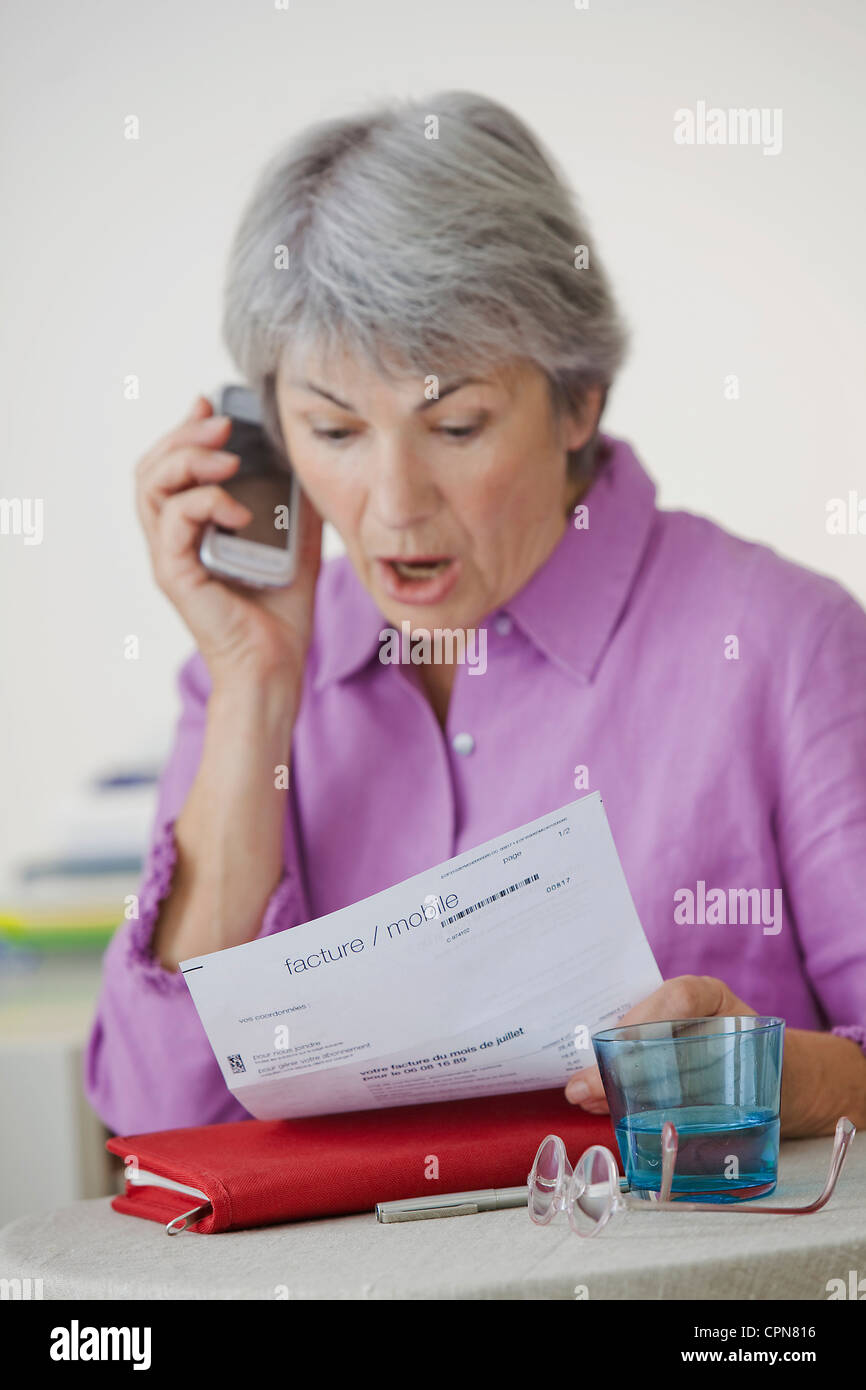 Elderly filling out forms hi-res stock photography and images - Alamy