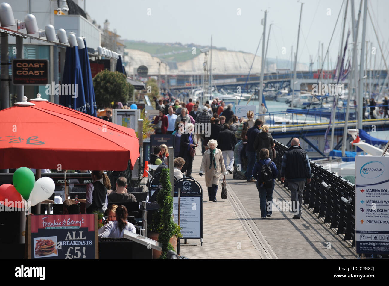 Busy Brighton Marina Boardwalk restaurants and cafe bars East Sussex UK ...