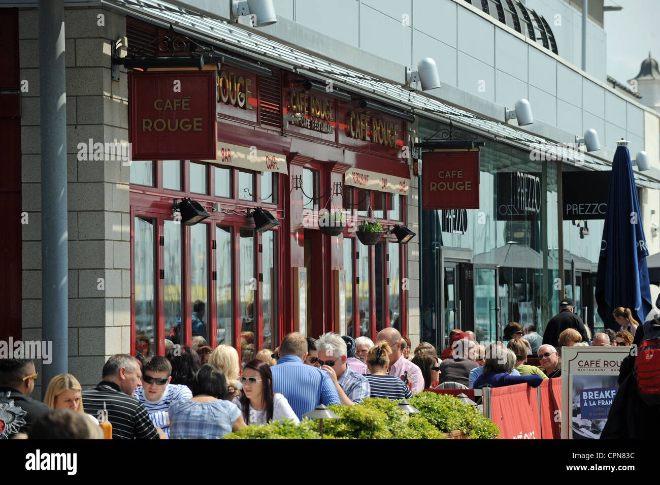 Busy Brighton Marina Boardwalk restaurants and cafe bars East Sussex UK ...