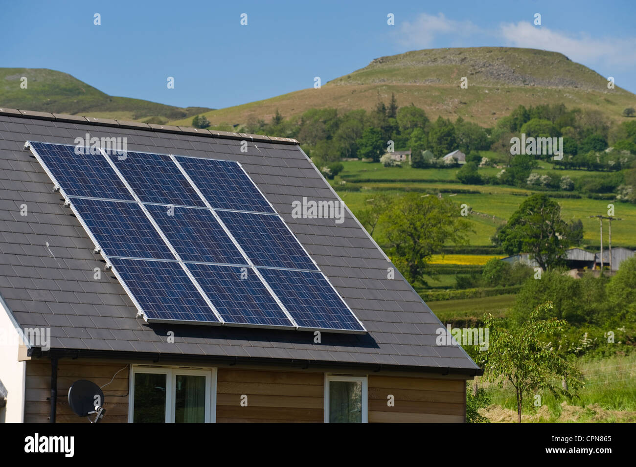 Solar panels on roof of houses in a rural housing development in ...