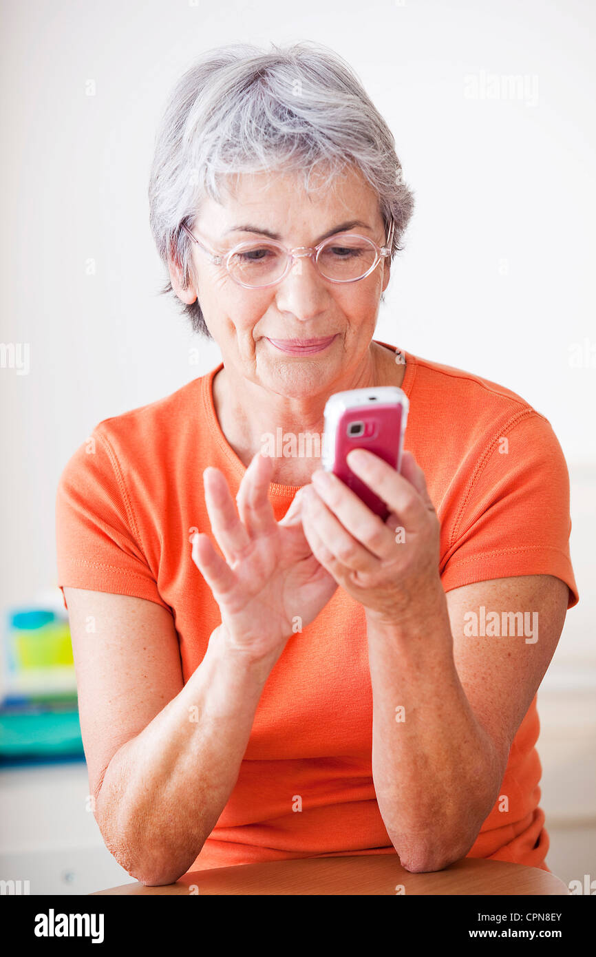 ELDERLY PERSON ON THE PHONE Stock Photo - Alamy