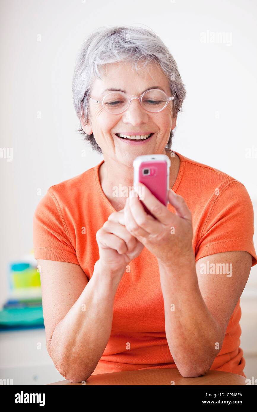 ELDERLY PERSON ON THE PHONE Stock Photo - Alamy