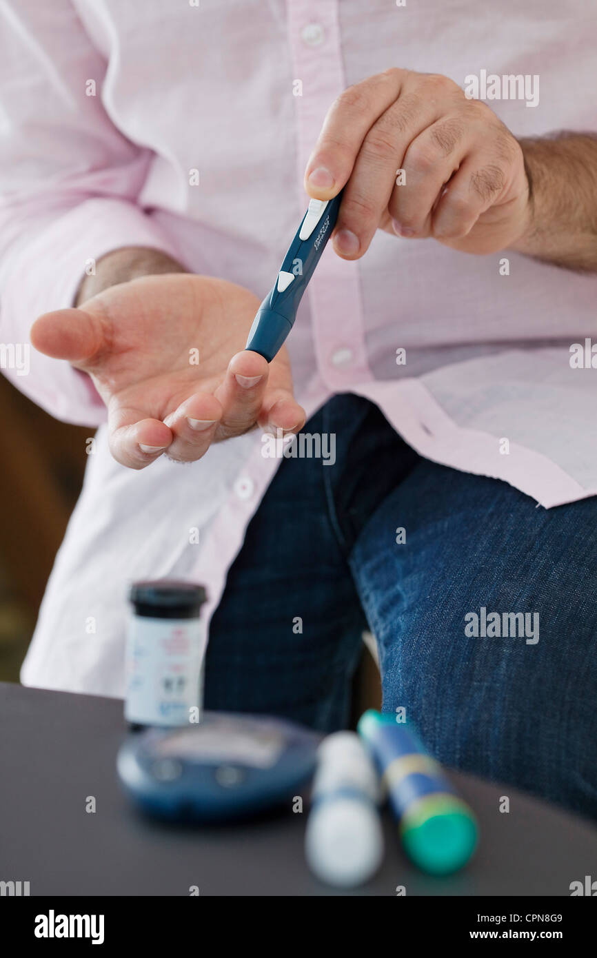 TEST FOR DIABETES, MAN Stock Photo - Alamy