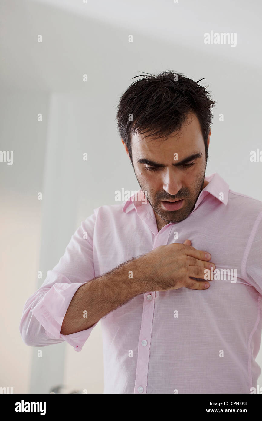 ANGINA PECTORIS, MAN Stock Photo - Alamy