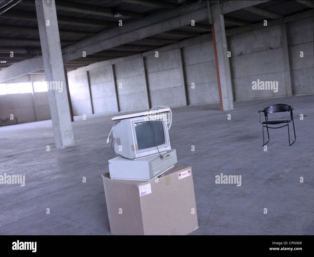 computing / electronics, computer, computer in empty factory hall ...