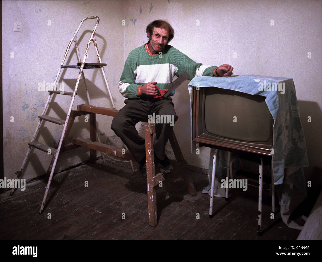 handicraft, handyman is renovating his flat, television set from the ...