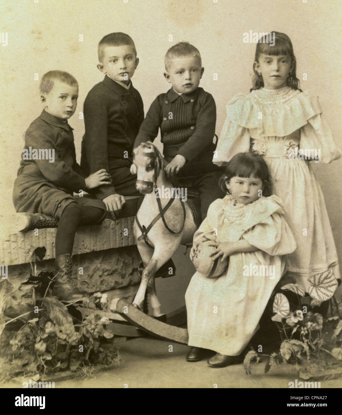 people,children,siblings with rocking horse,Stuttgart,Germany,circa ...