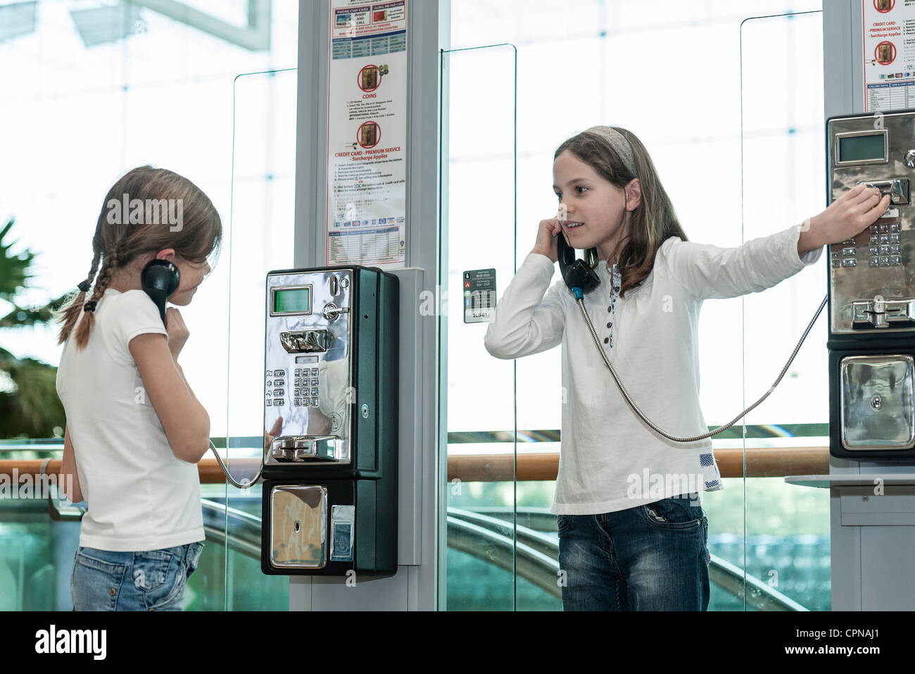 Children using payphones Stock Photo - Alamy