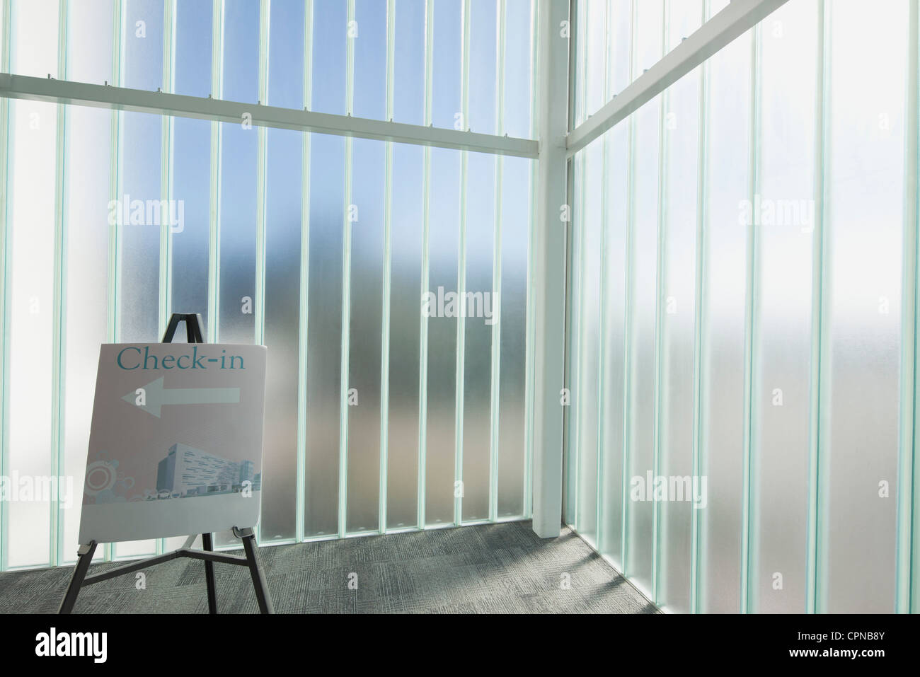 Sign in lobby indicating "check-in Stock Photo - Alamy