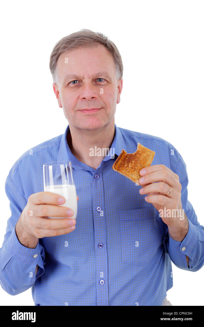 Handsome man holding toast bread and milk. Isolated on white Stock ...